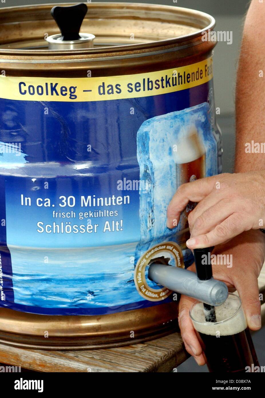 (dpa) - A glass of cool beer is tapped from a self-cooling beer keg in ...