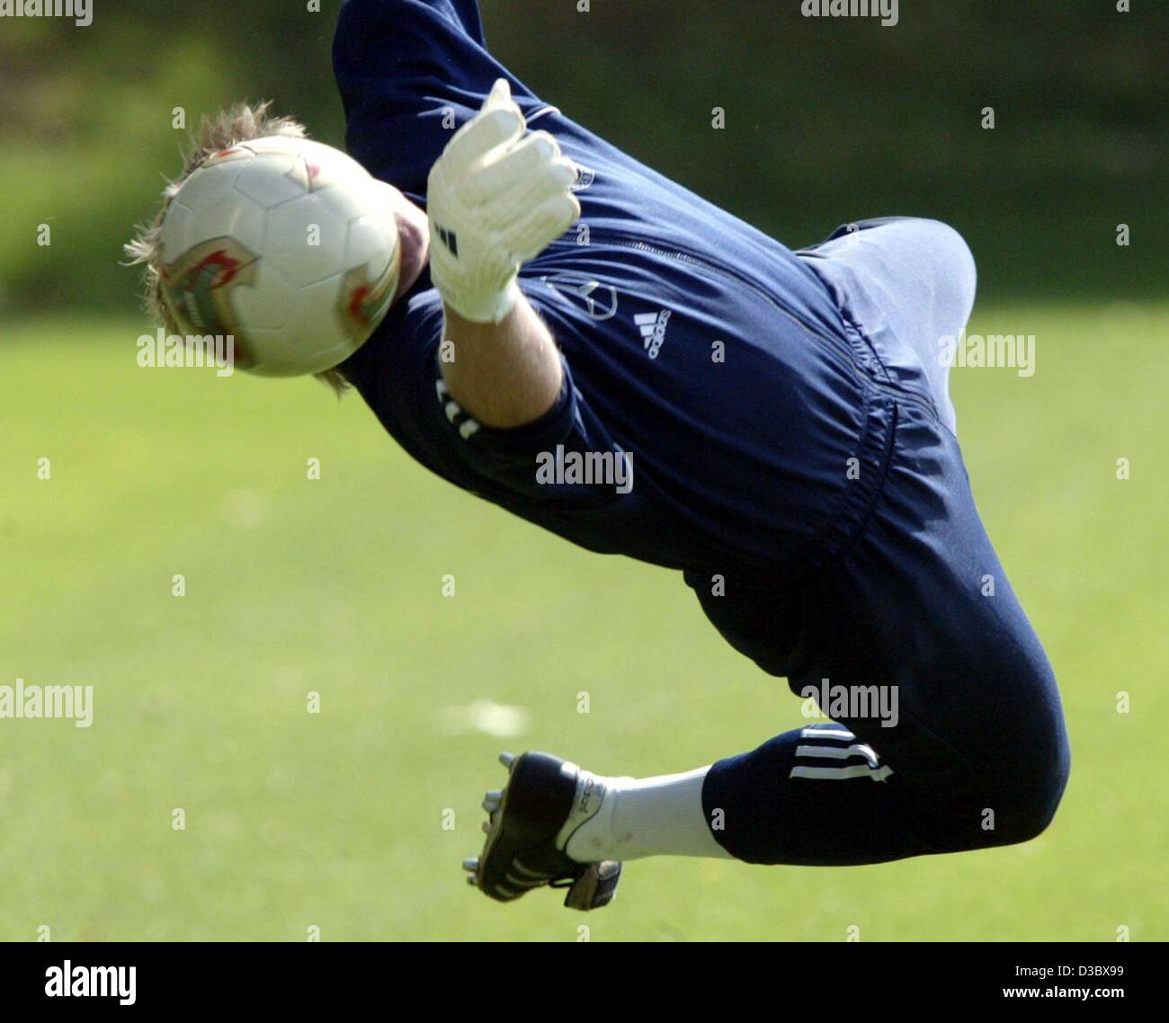 Sports spo soccer training saving ball jumping germany hi-res stock ...