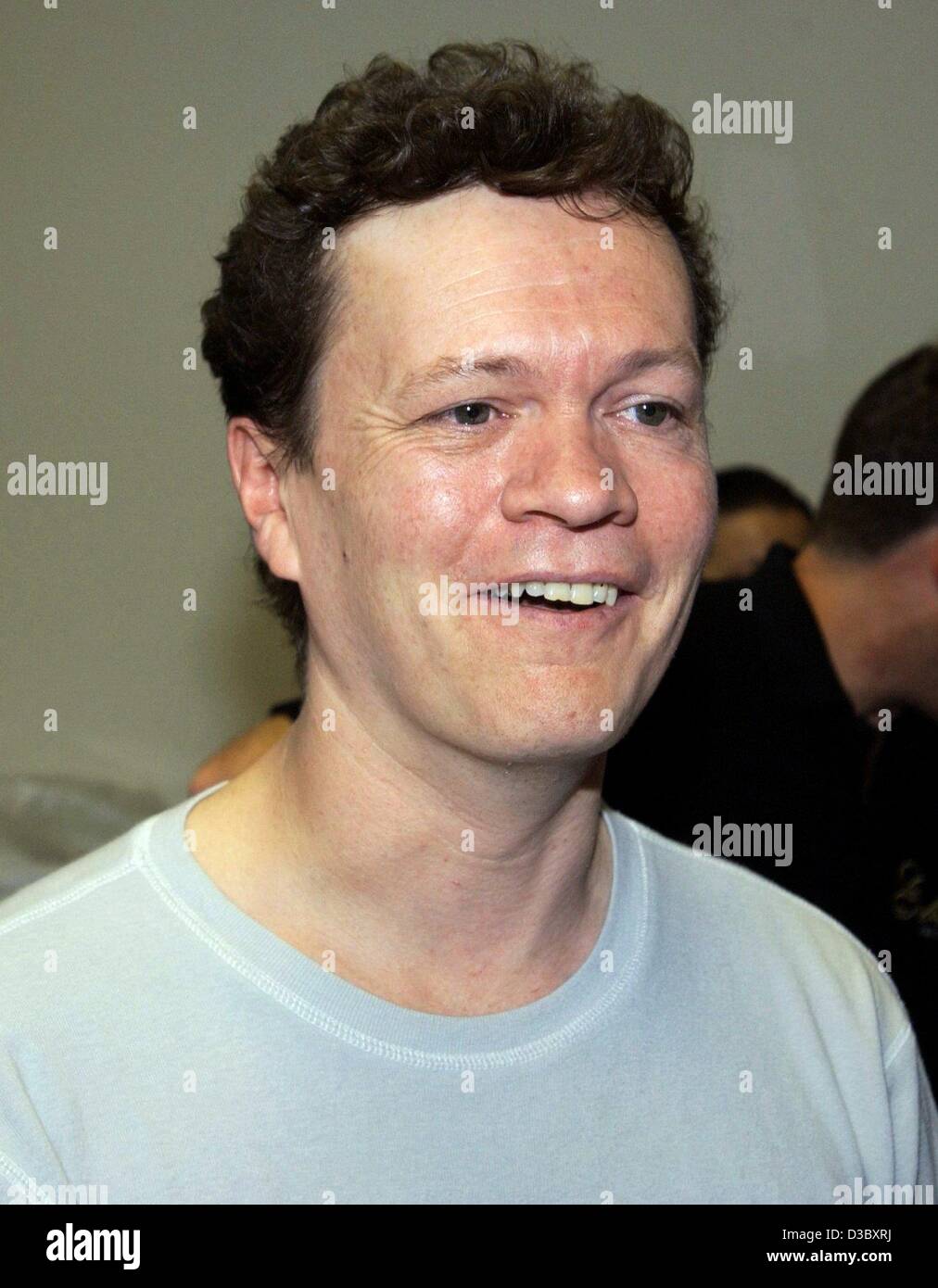 (dpa) - Stage director James Powell smiles at the beginning of the ...