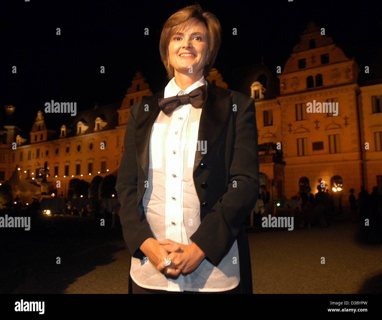 (dpa) - Princess Gloria von Thurn und Taxis poses in front of her ...