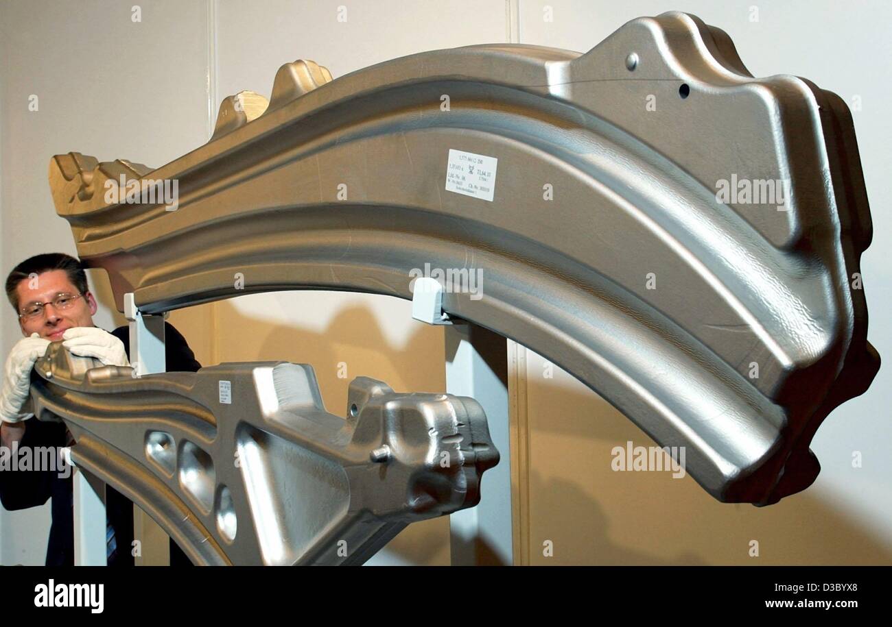 (dpa) - Dag Neudenberger touches a so called 'flap track' made from ...