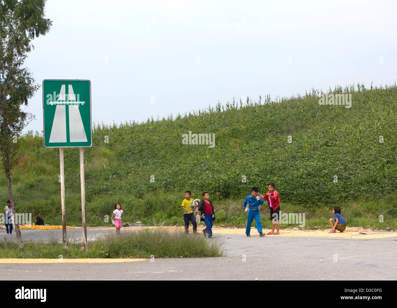 Kids Playing In Front Of A Highway Entrance, Panmunjeom, North Korea ...