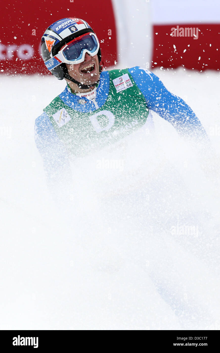 Manfred Moelgg of Italy stops in the finish area during the second run ...
