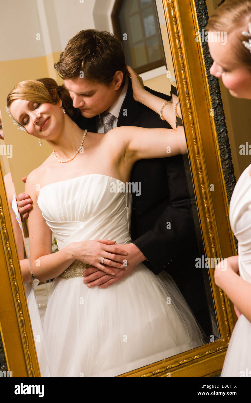 Bride and groom, the mirror on background Stock Photo - Alamy
