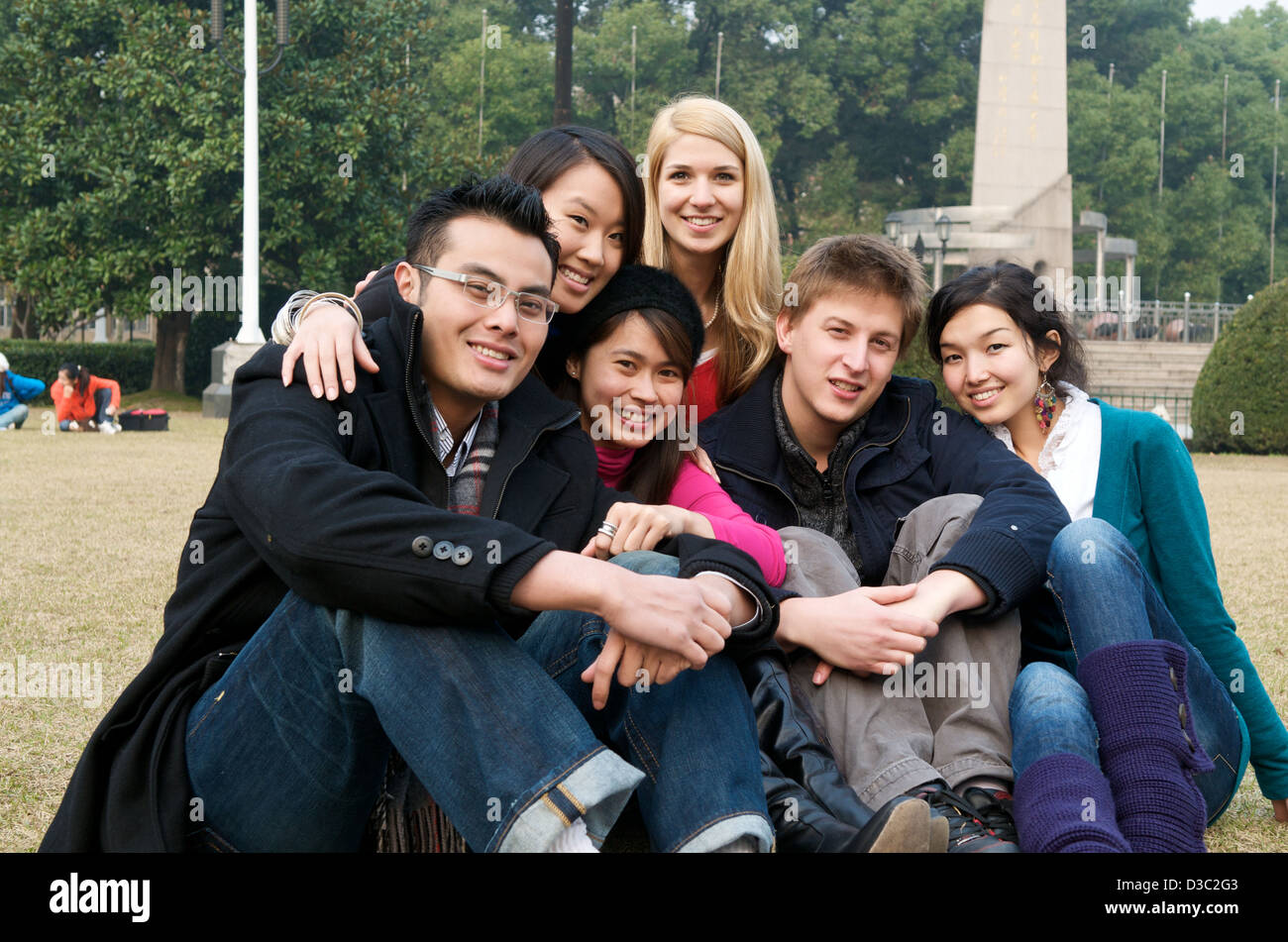 Group of smiling students on campus Stock Photo - Alamy