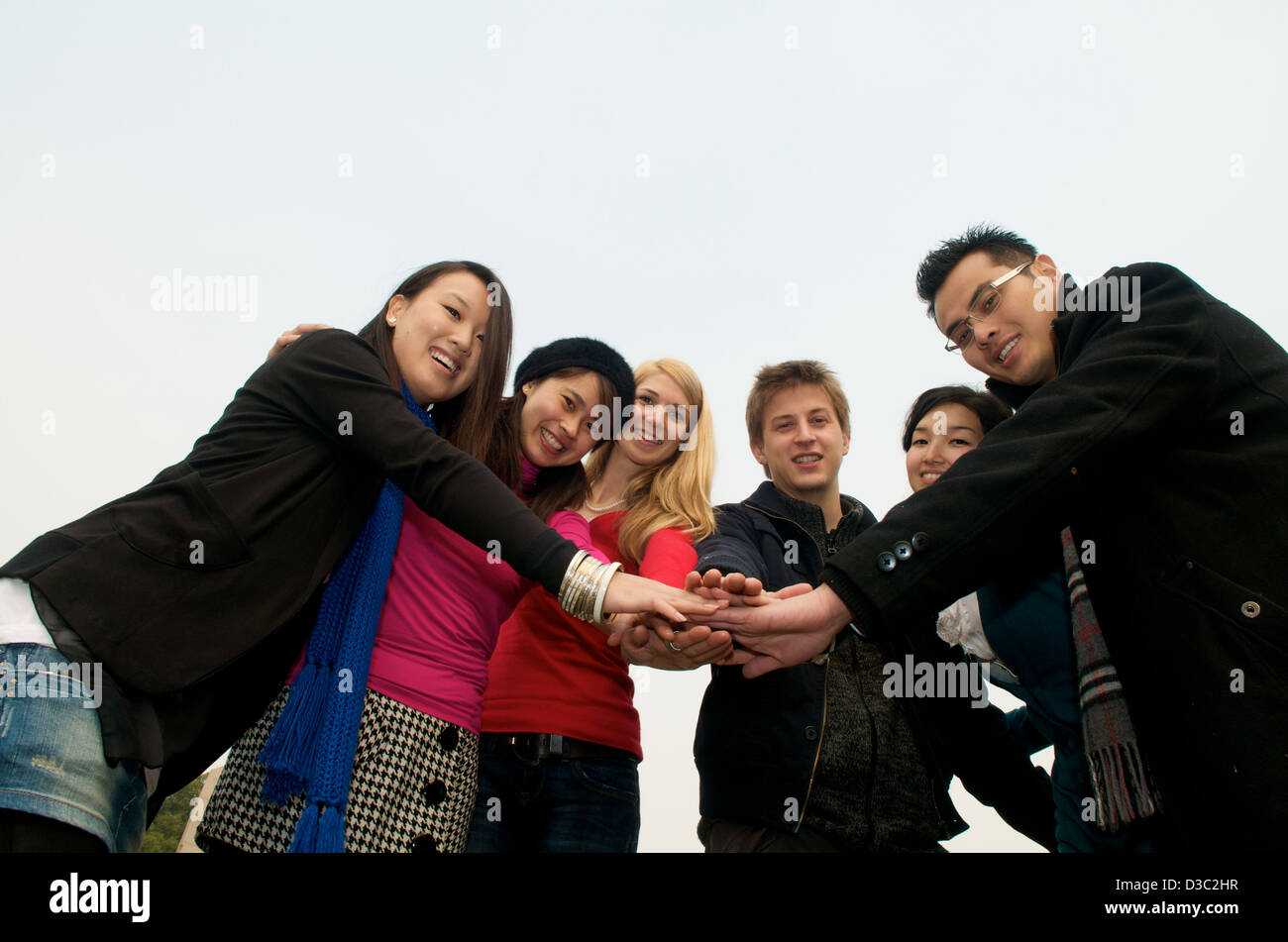 Group of 6 students outdoor team spirit Stock Photo - Alamy