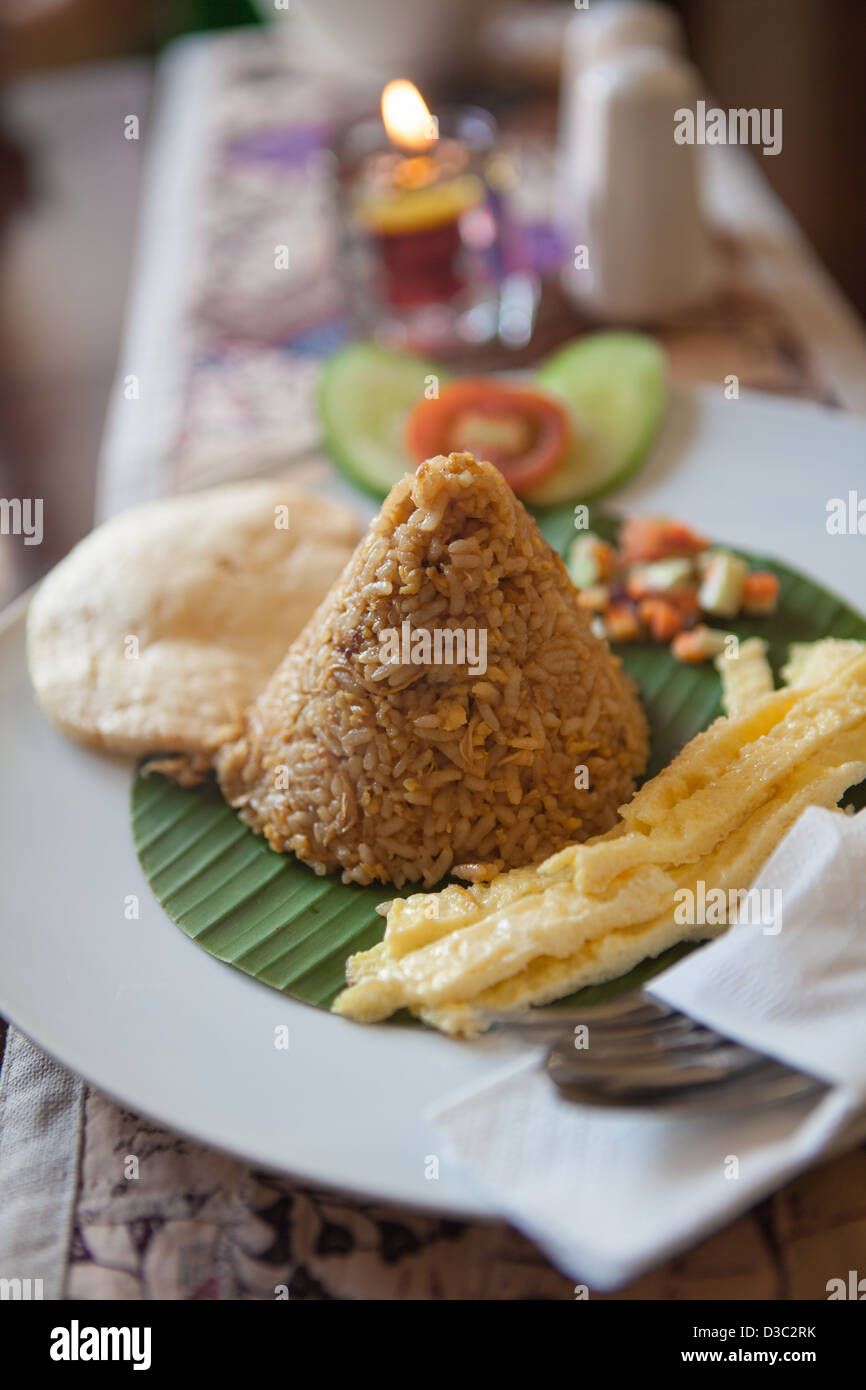 Indonesian traditional breakfast; Nasi Goreng or Fried Rice Stock Photo ...