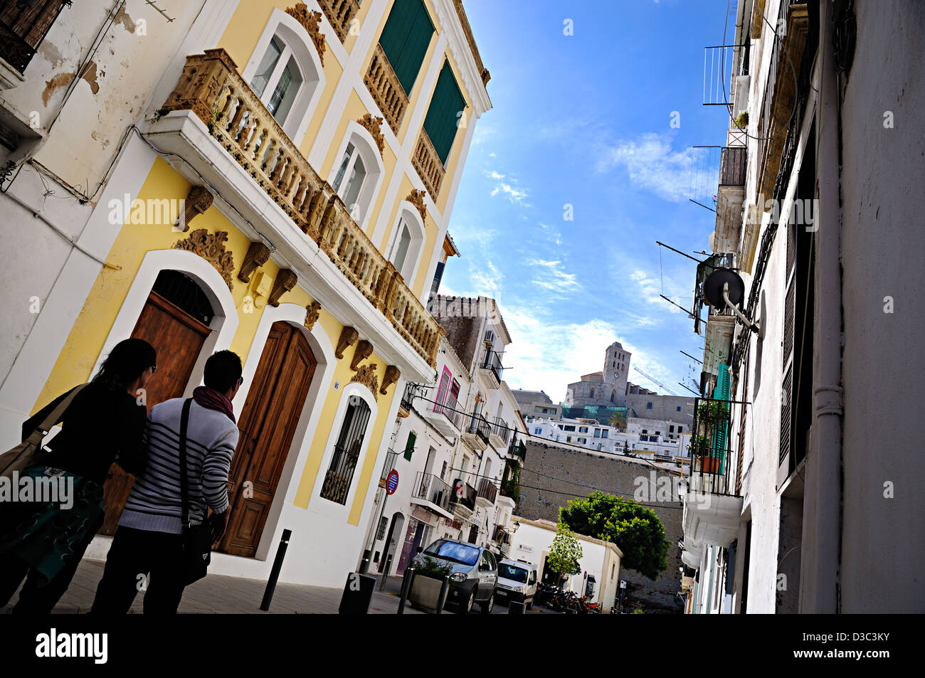 Tourists walking by La Marina neighborhood, Ibiza town, Balearic ...