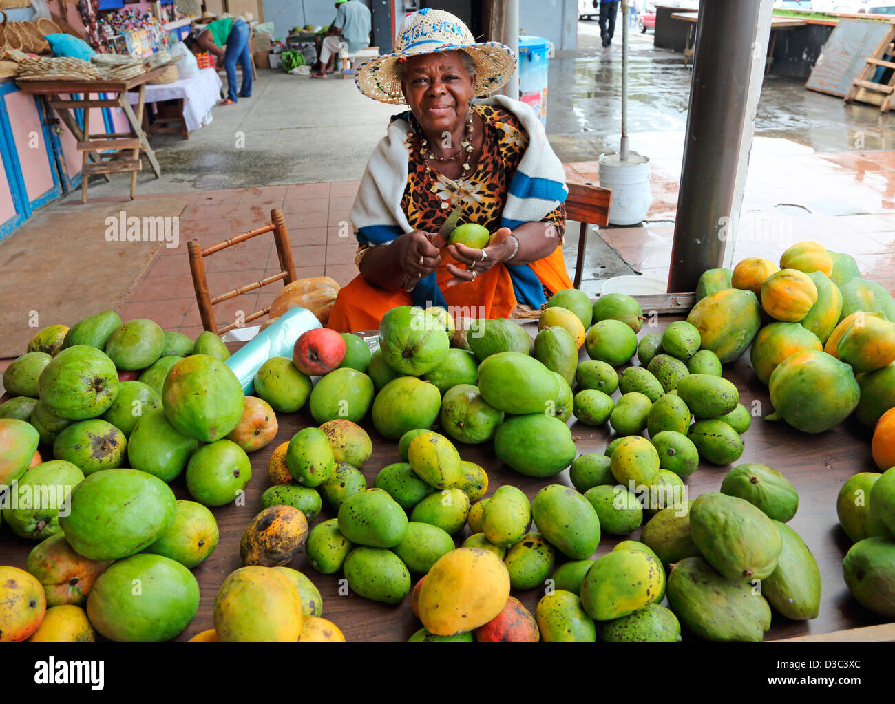LOCAL WOMAN SELLING MANGOES,CASTRIES MARKET,ST.LUCIA Stock Photo - Alamy