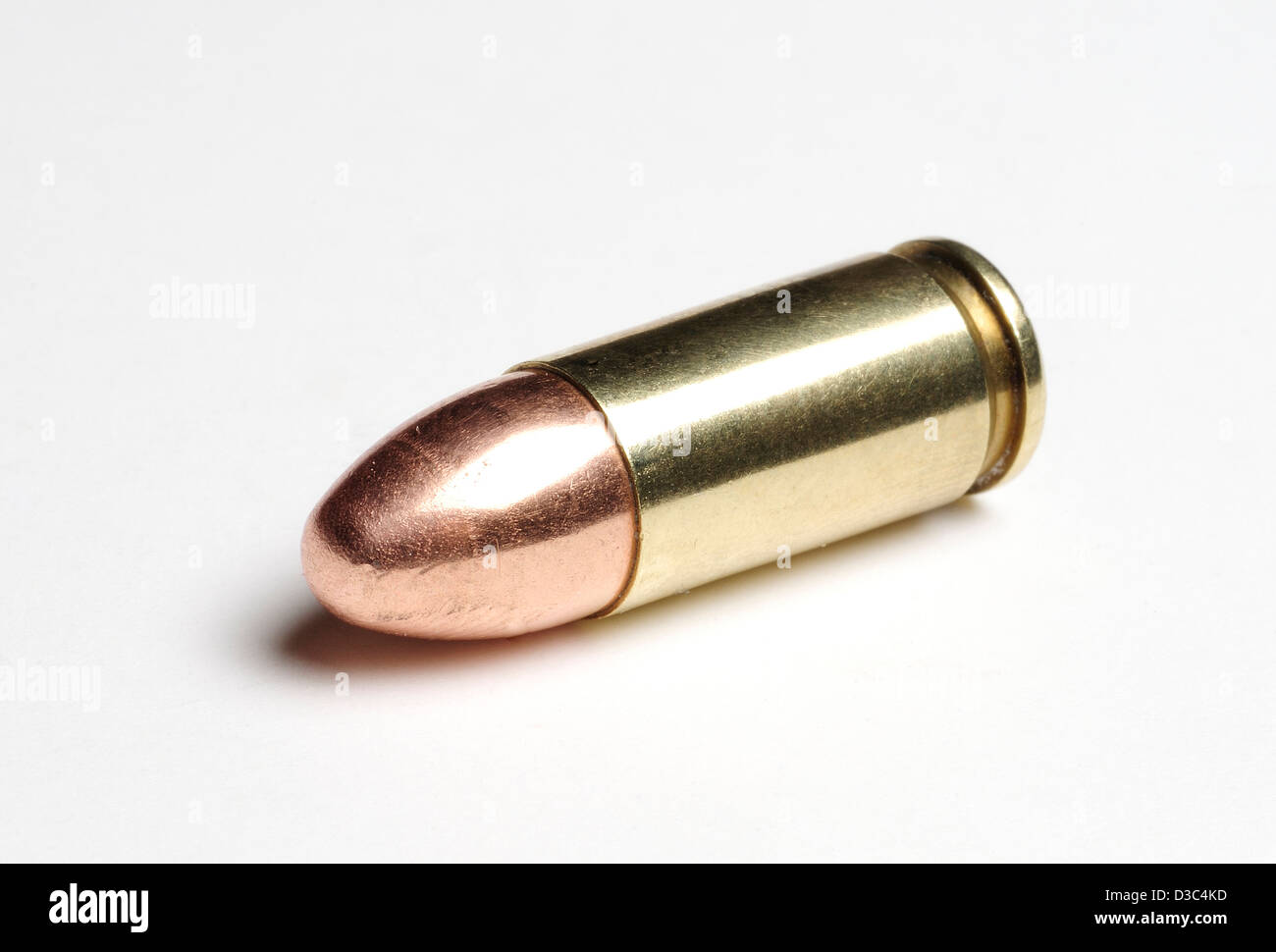 9mm Winchester Luger bullet against white backdrop Stock Photo - Alamy