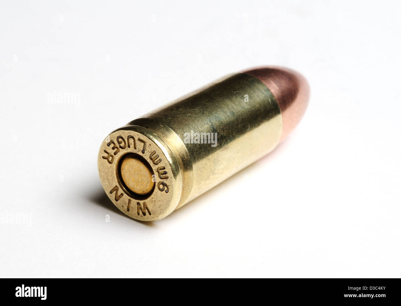 9mm Winchester Luger bullet against white backdrop Stock Photo - Alamy