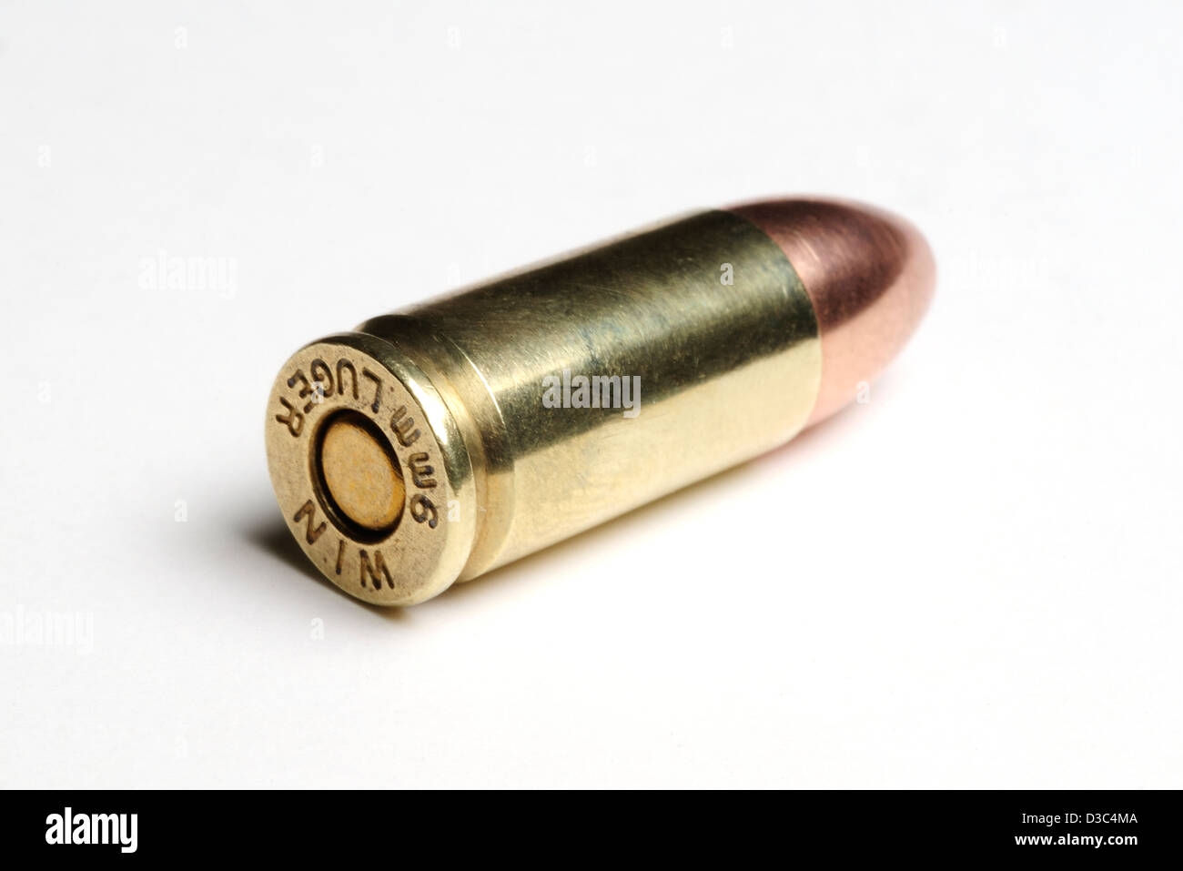 9mm Winchester Luger bullet against white backdrop Stock Photo - Alamy