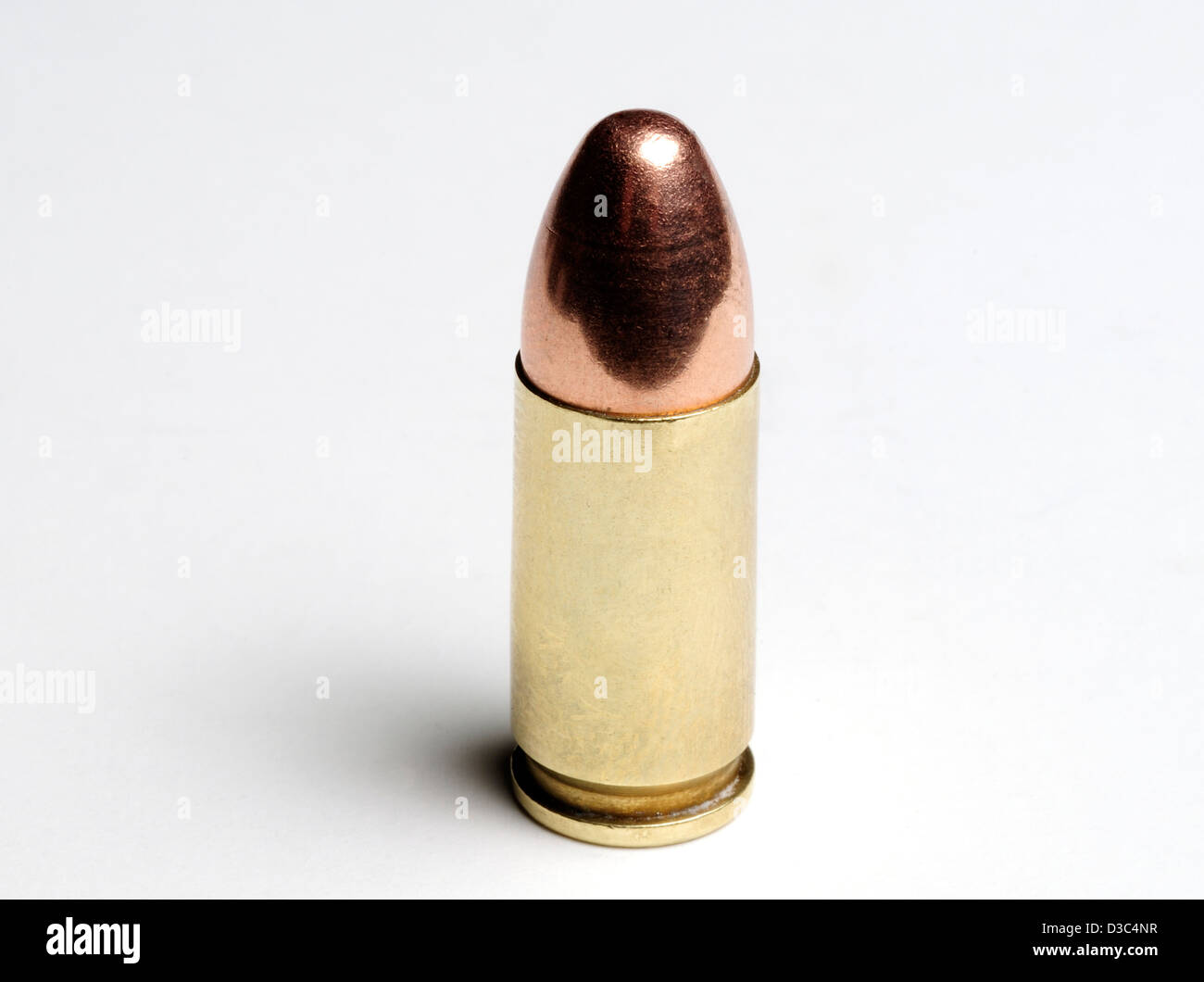 9mm Winchester Luger bullet against white backdrop Stock Photo - Alamy