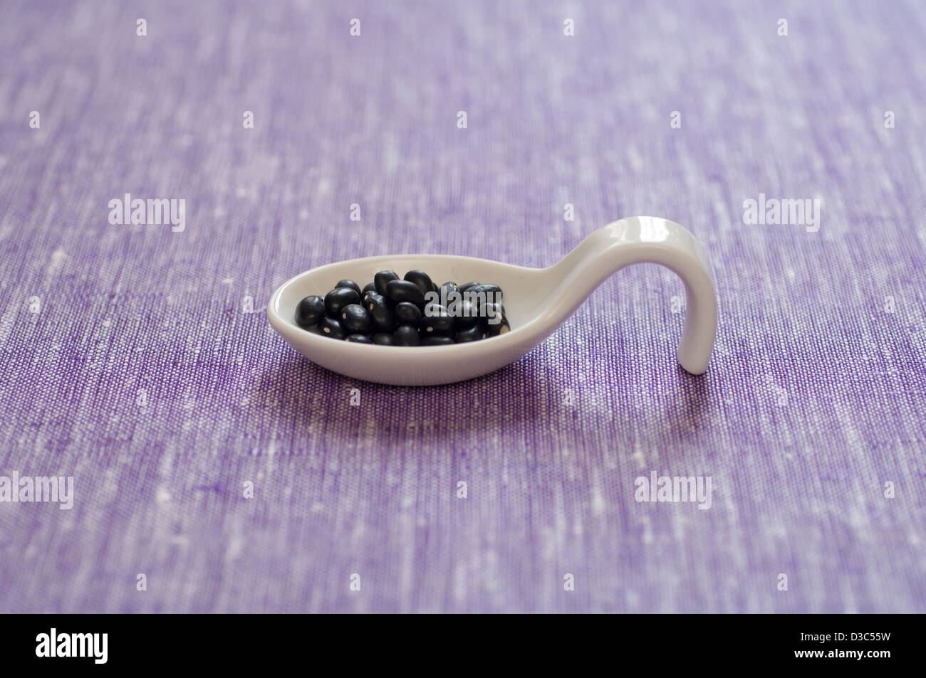 Spoon black beans hi-res stock photography and images - Alamy