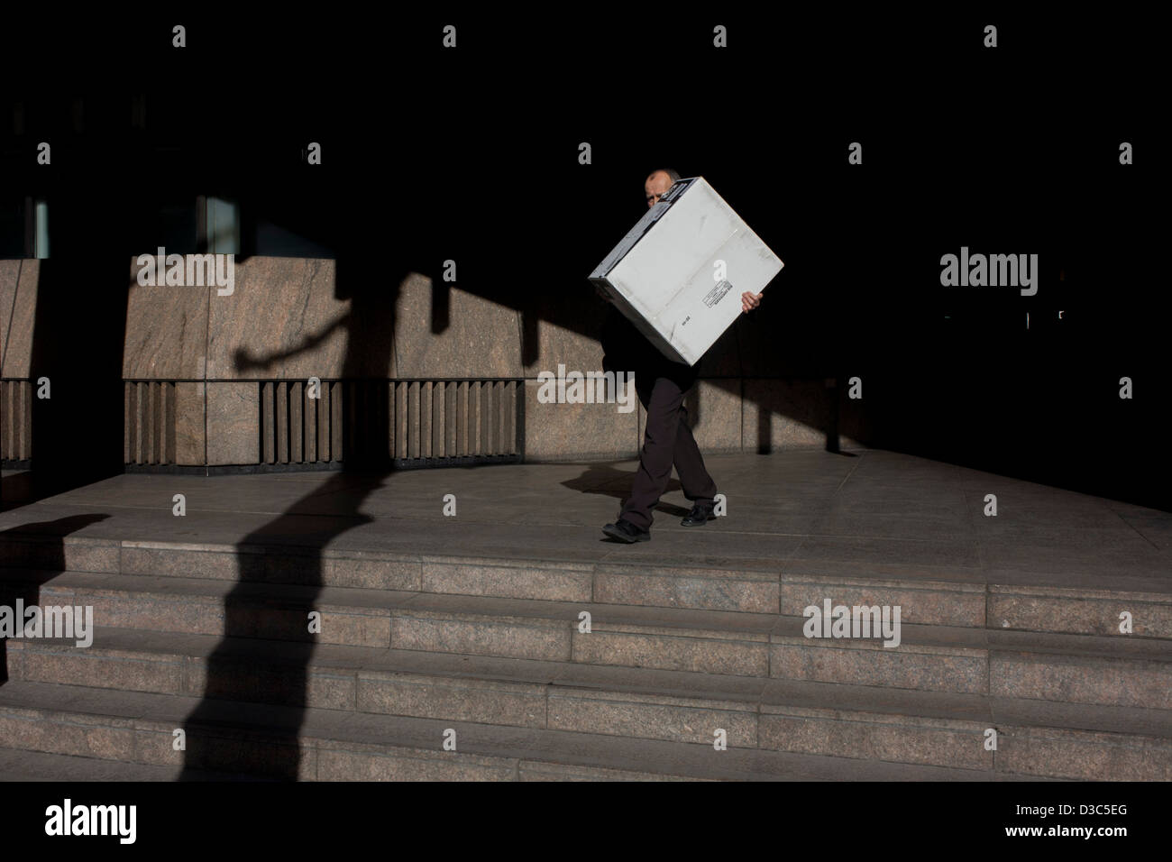Man peering over wall hi-res stock photography and images - Alamy