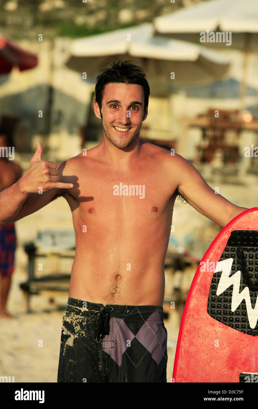 Portrait young men - the surfer Stock Photo - Alamy