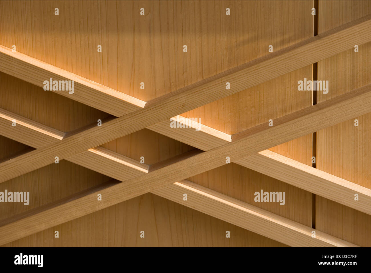 Fine Japanese tsugite wood joinery is exhibited in a crisscross pattern ...