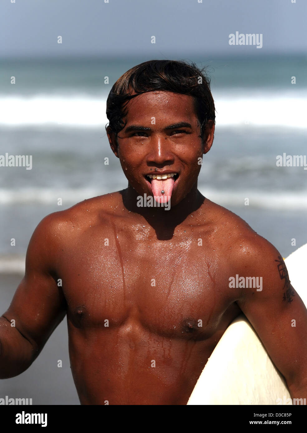 Portrait young men - the surfer Stock Photo - Alamy