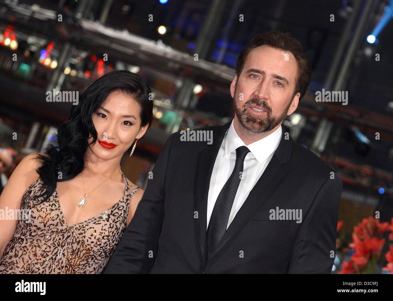 US actor Nicolas Cage and his wife Alice Kim arrive for the premiere of ...