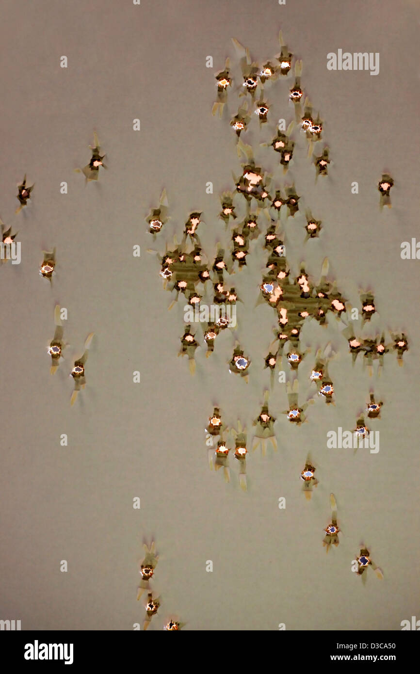 Old paper target with set of apertures from bullets Stock Photo - Alamy