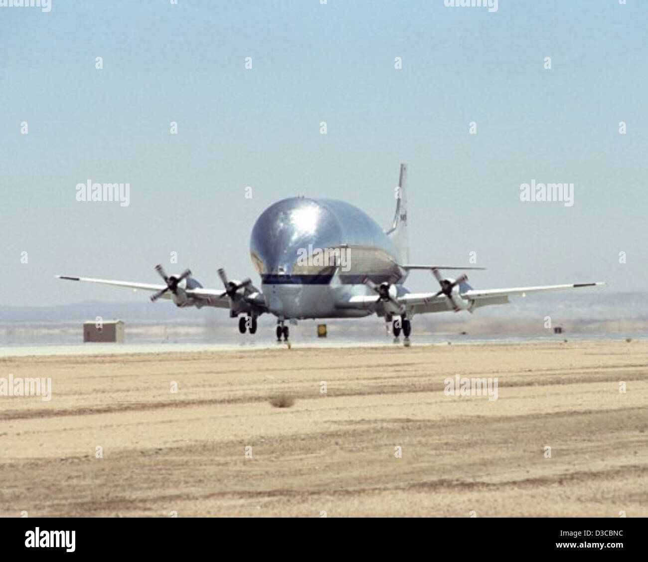 The NASA Super Guppy, a large cargo aircraft, is seen transporting the ...
