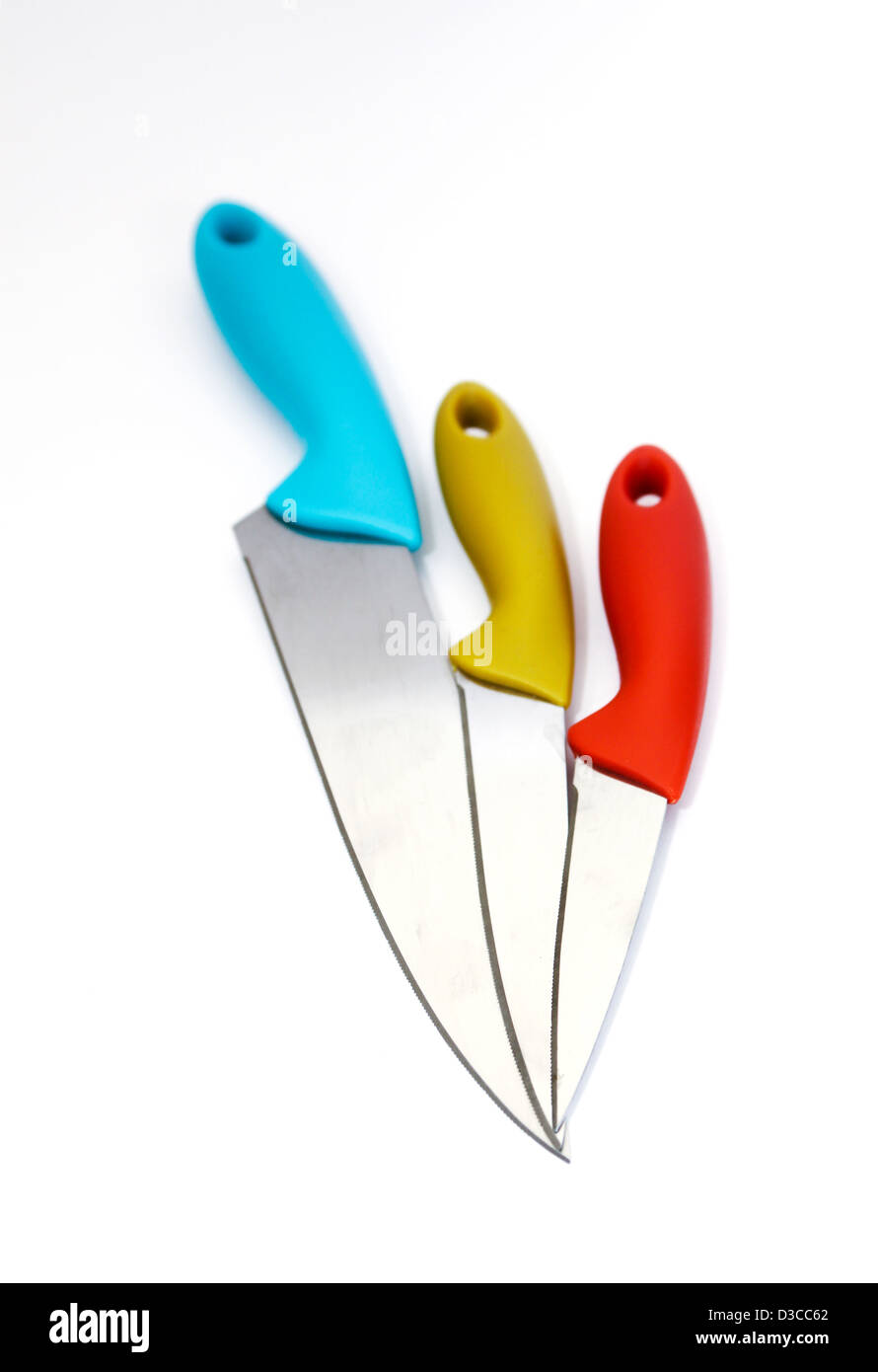 Three kitchen knives with colourful plastic handles Stock Photo - Alamy