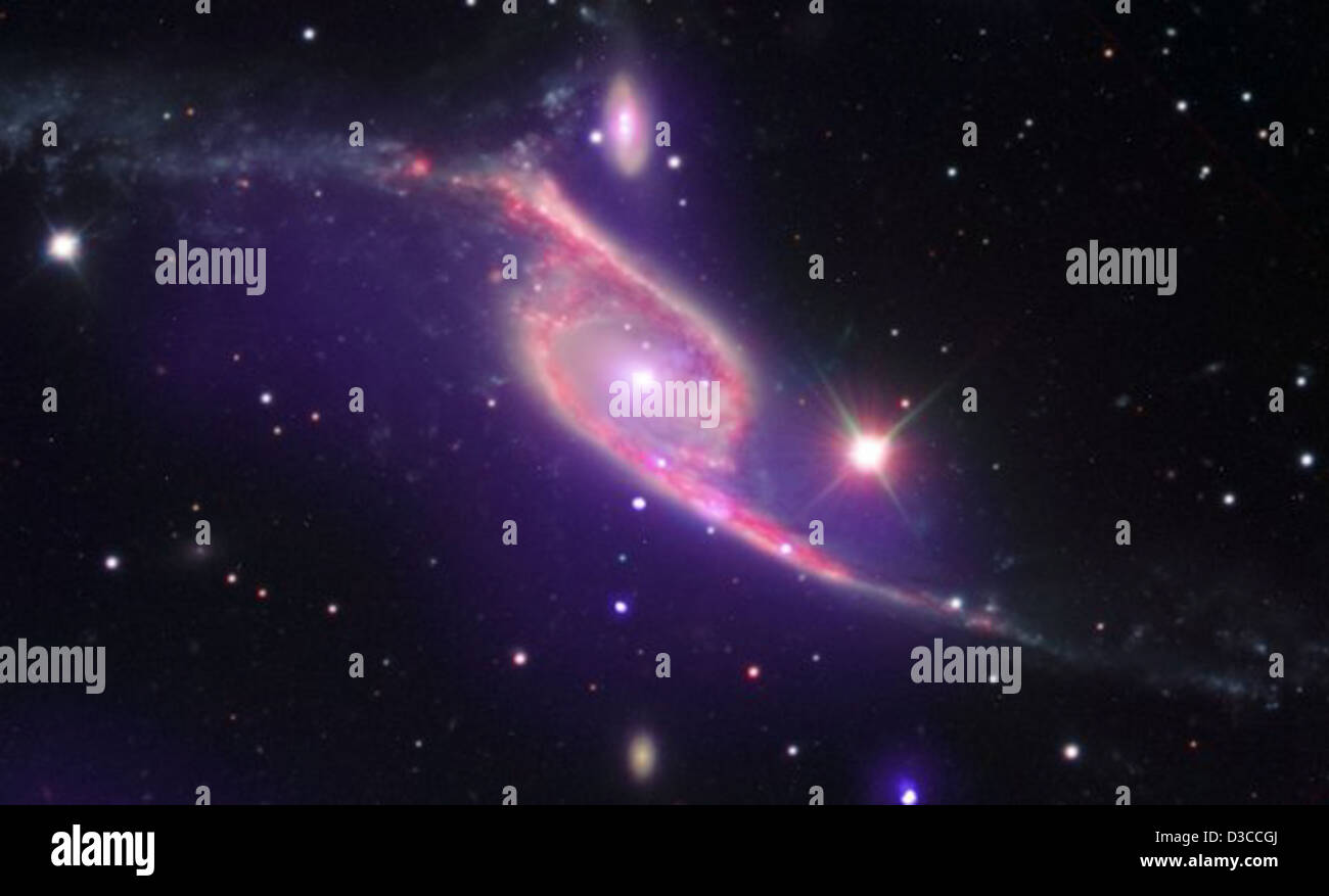 A galaxy collision in the IC 4970 and NGC 6872 system triggers the ...