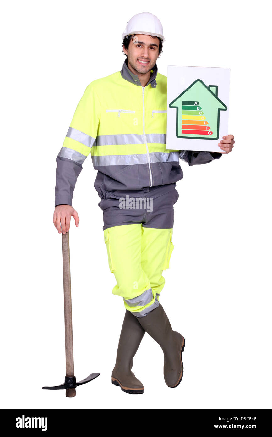 handsome heating engineer with hand resting on pickaxe Stock Photo - Alamy