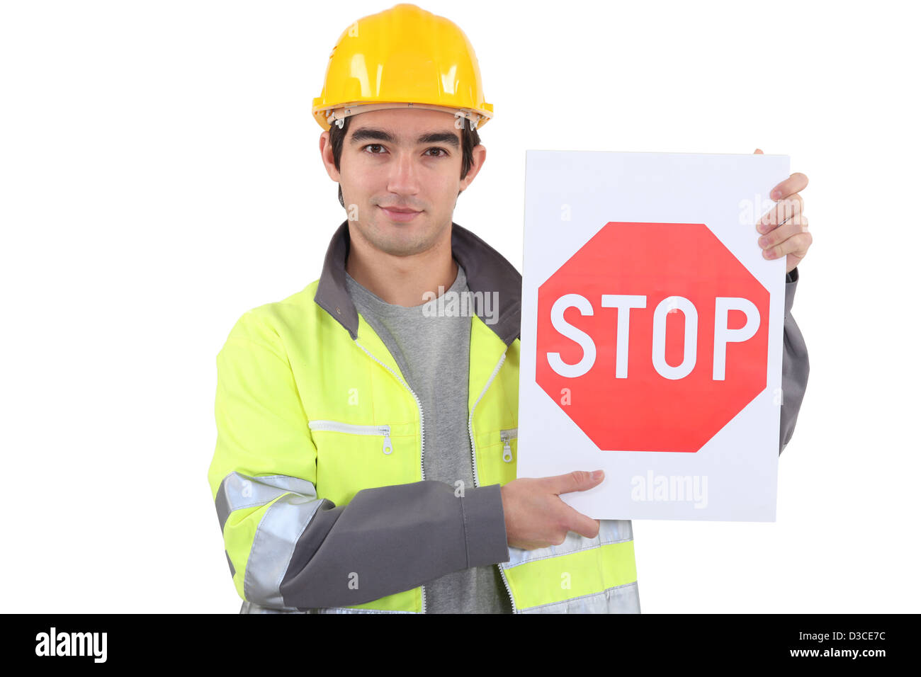 Worker with stop sign Stock Photo - Alamy