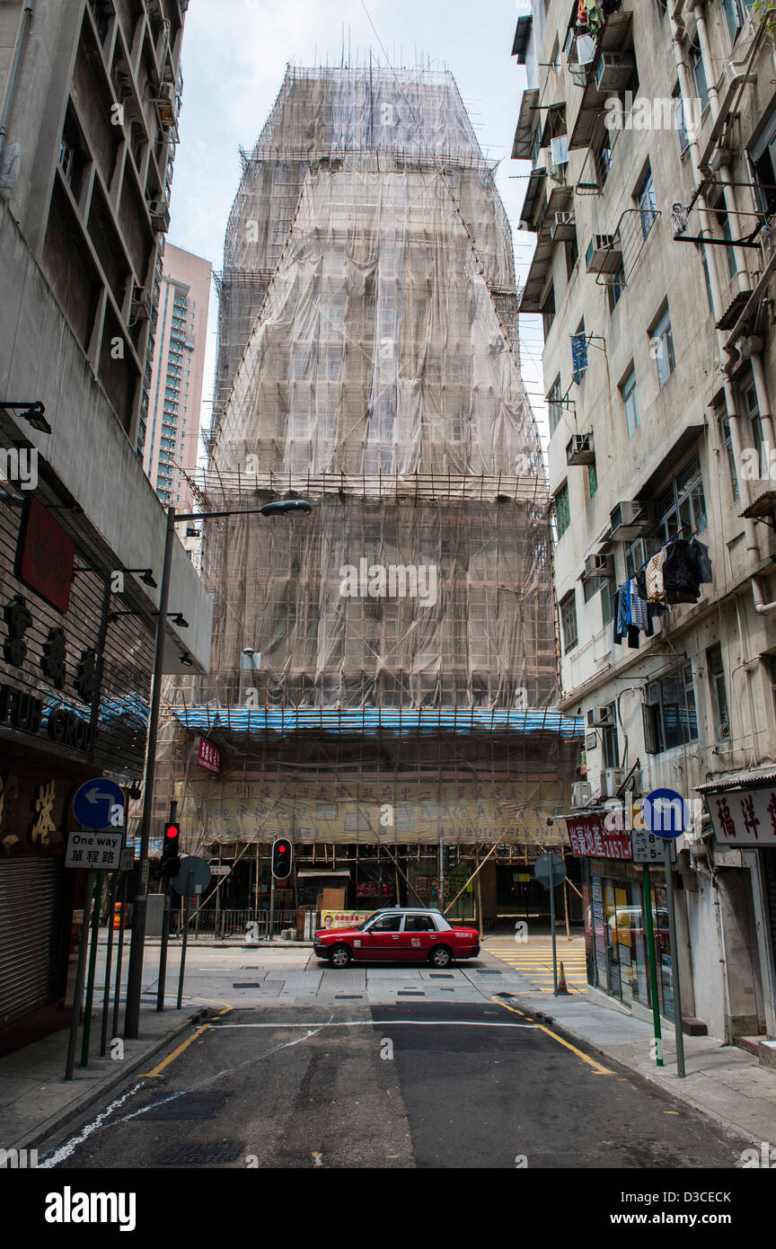 Bamboo scaffolding built up around the Kiu Fat Building ,still being ...