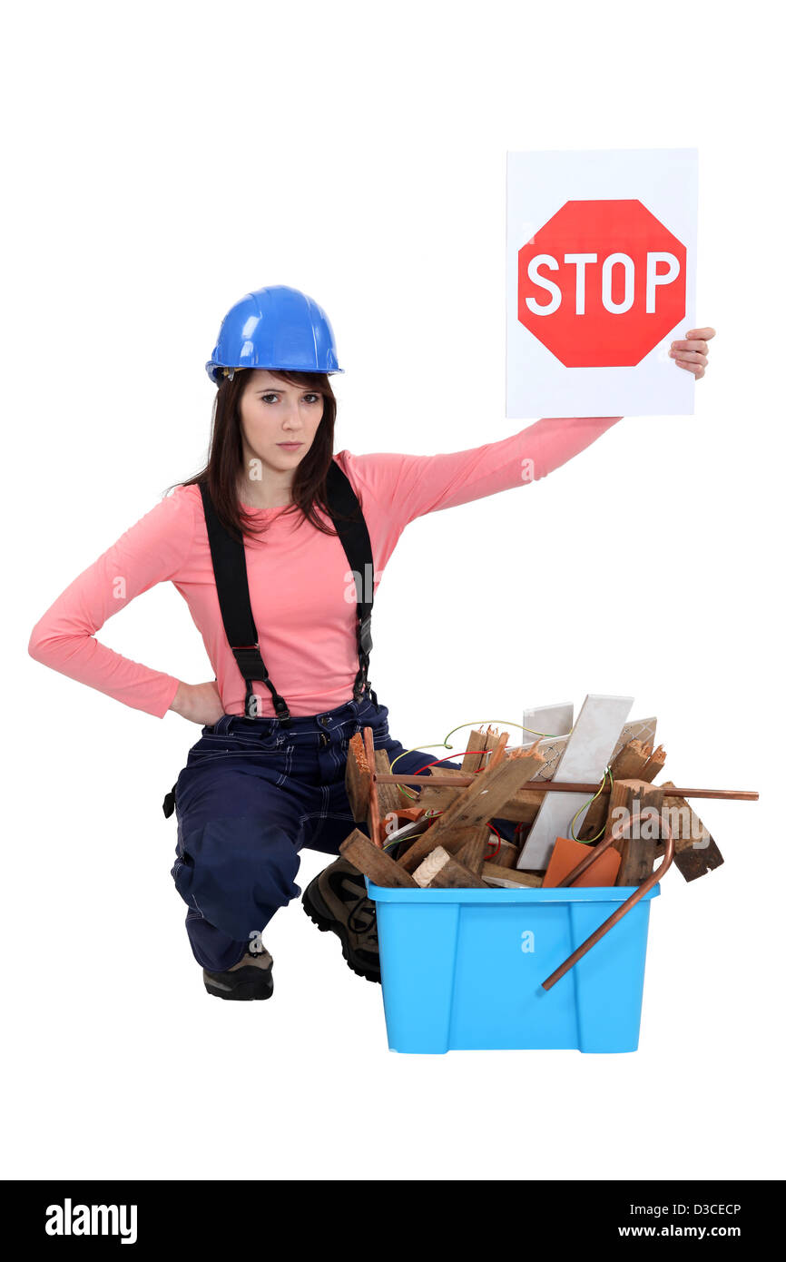 Female construction worker campaigning against littering Stock Photo ...