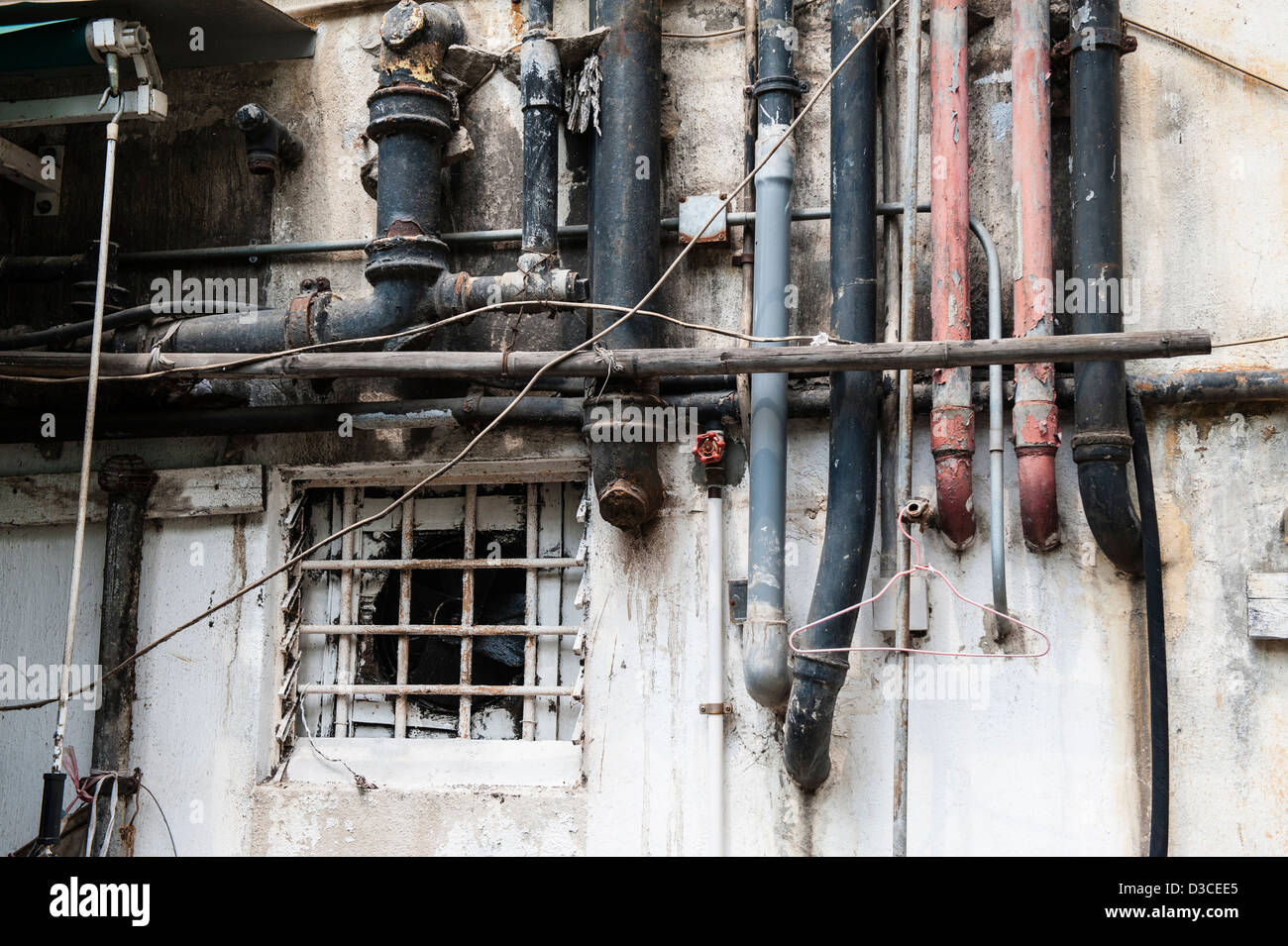 Hong Kong, March 2012 Aging pipes mostly at the outside of buildings in ...