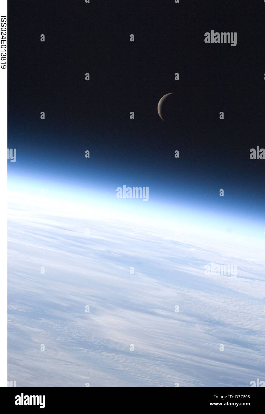The crescent moon is seen from the International Space Station, with ...