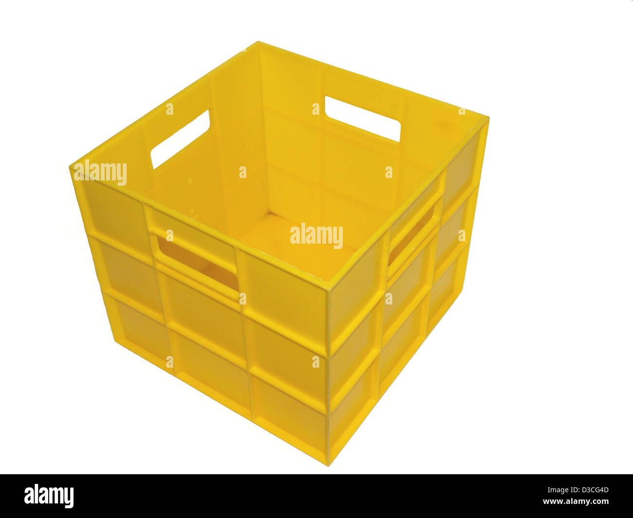 Yellow plastic storage crate on a plain white background Stock Photo ...
