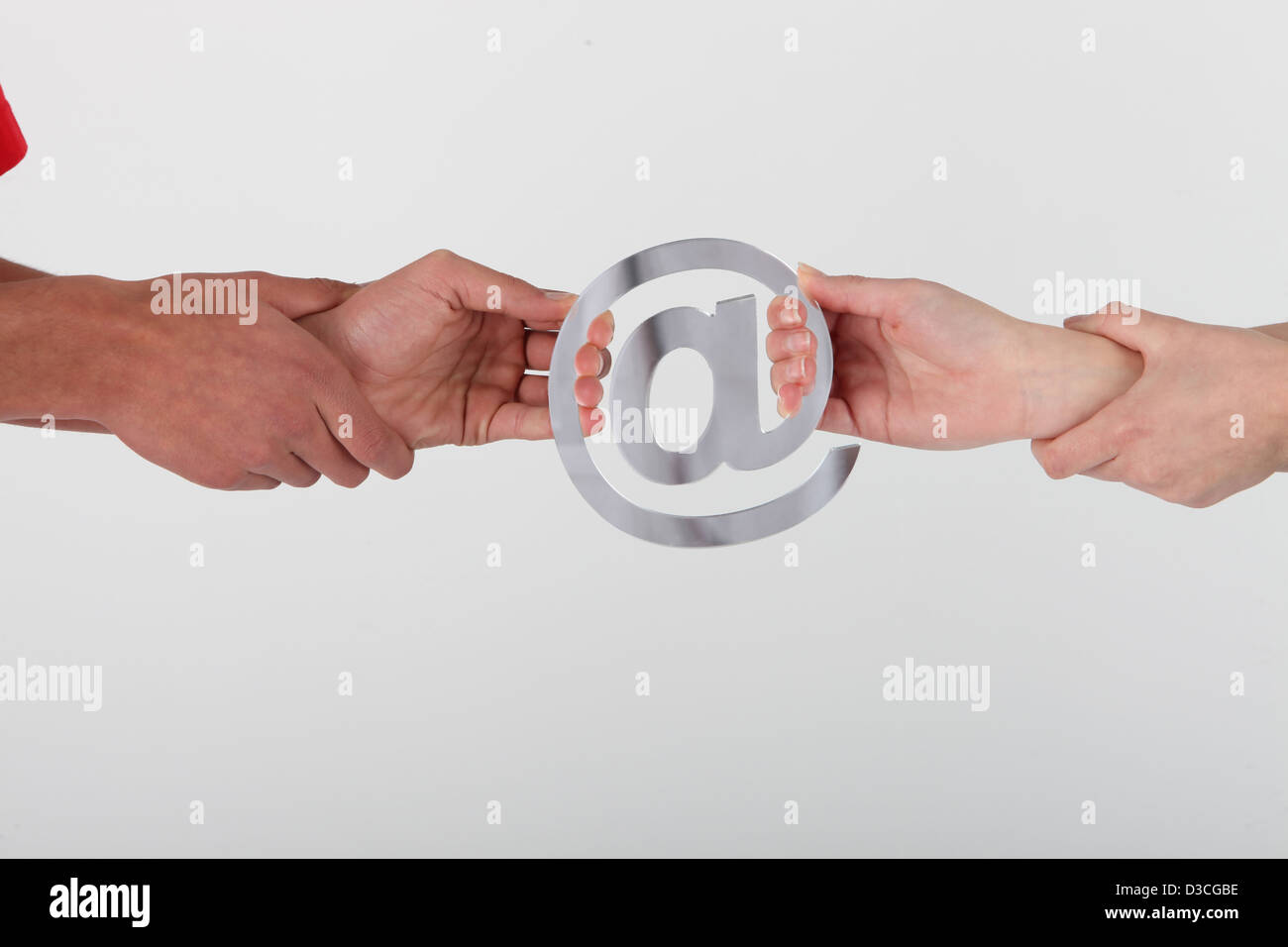 two people pulling an Stock Photo - Alamy