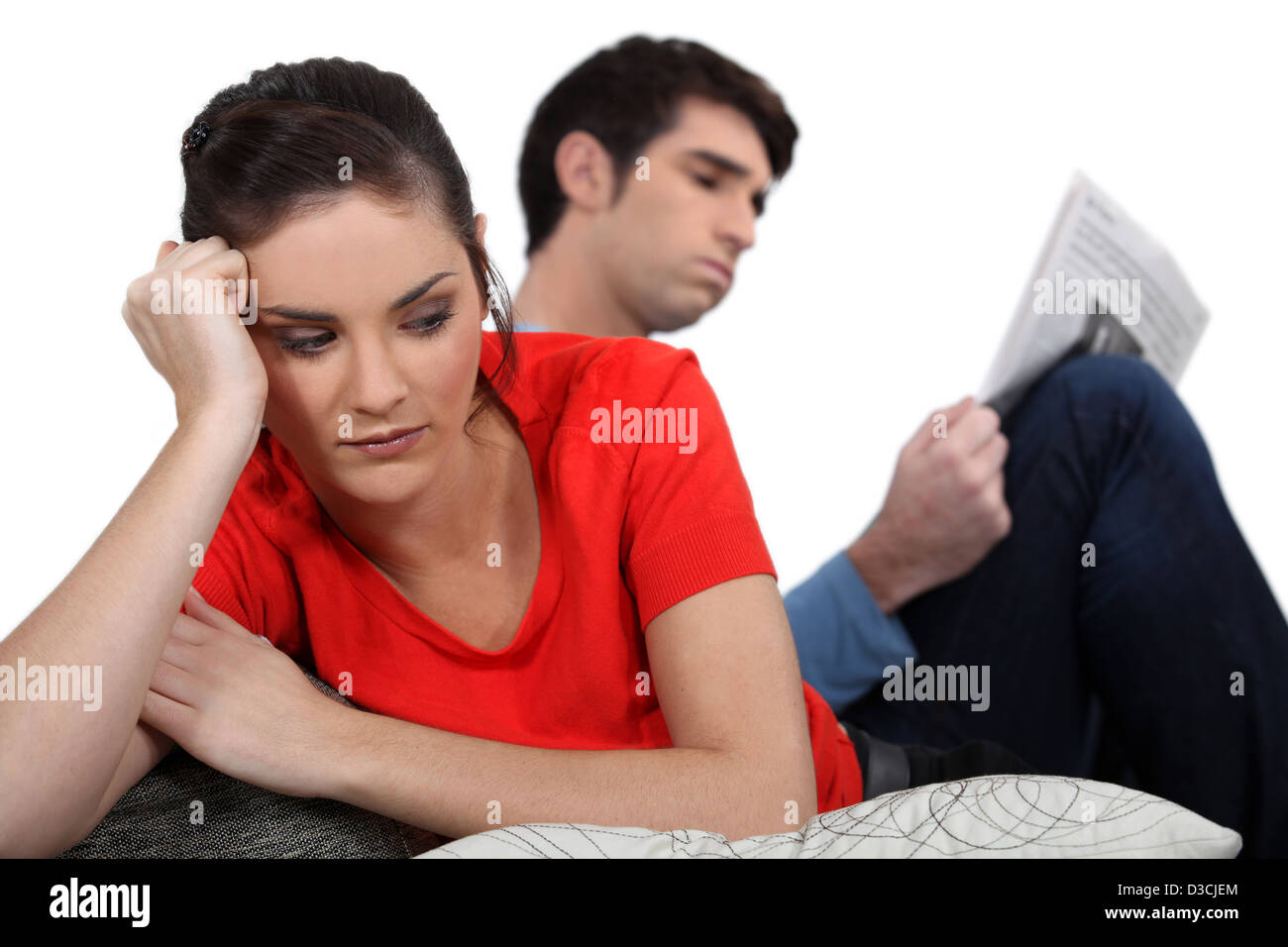 Bored couple sat at home Stock Photo - Alamy