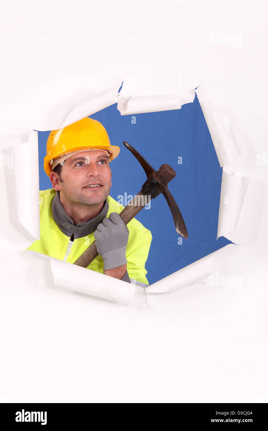 Man with a pickaxe Stock Photo - Alamy