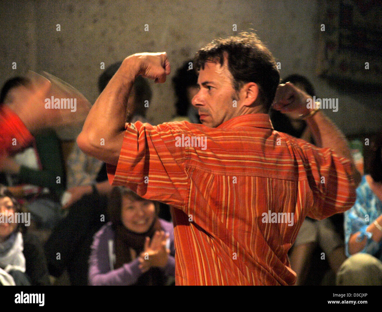 Western tourist dancing during Turkish Night Show of traditional dances ...