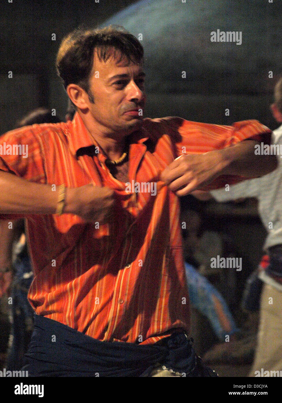 Western tourist dancing during Turkish Night Show of traditional dances ...