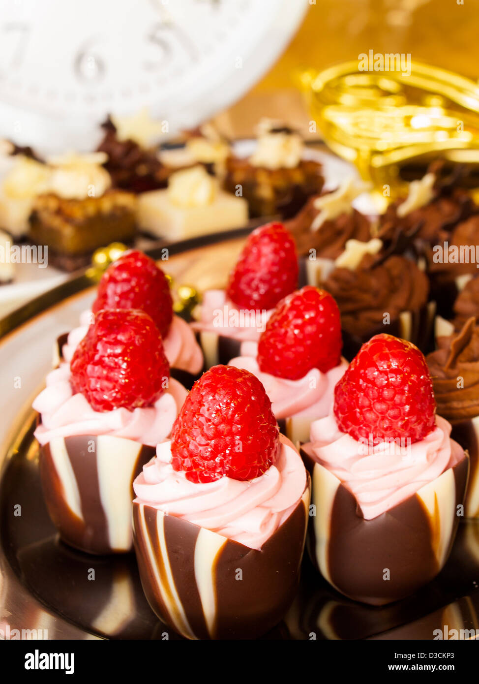 Gourmet assorted petite party pastries decorated for New Year Eve ...