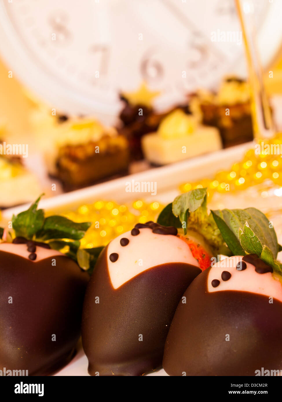 Gourmet assorted petite party pastries decorated for New Year Eve ...