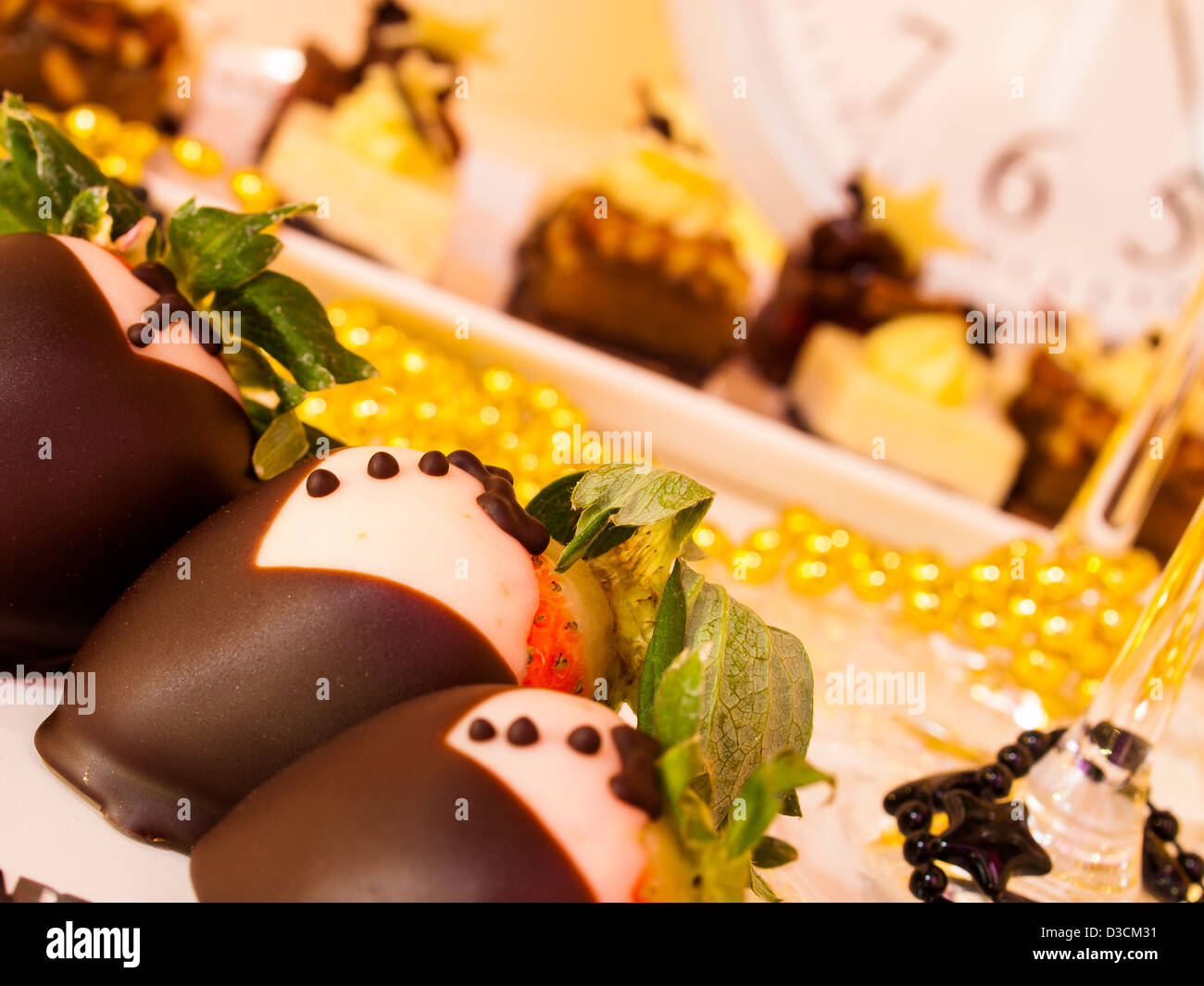 Gourmet assorted petite party pastries decorated for New Year Eve ...