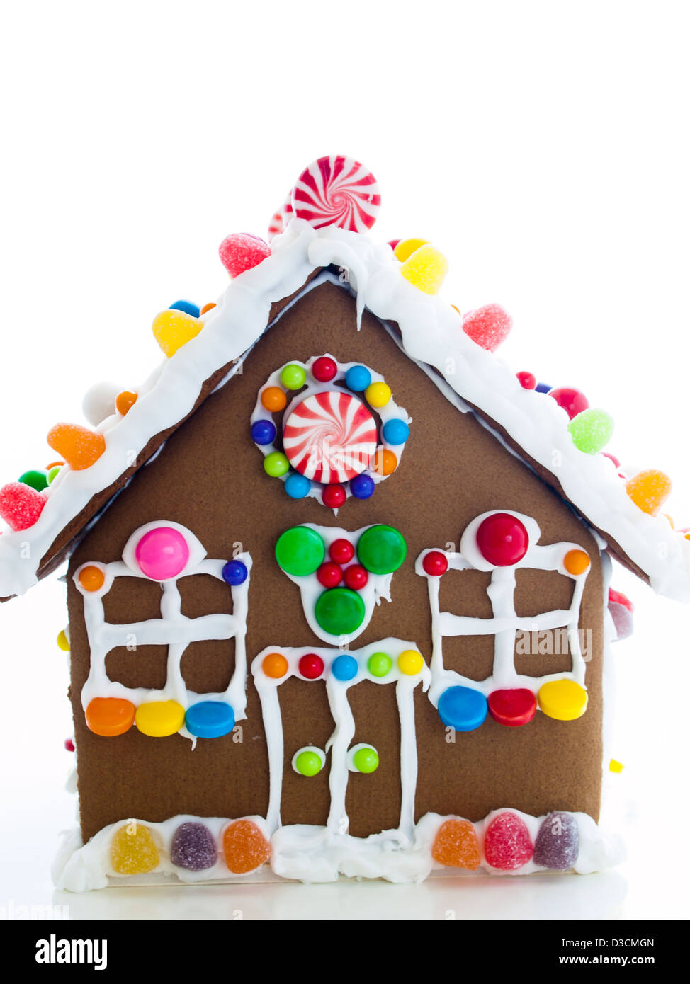 Decorated gingerbread house on white background Stock Photo - Alamy