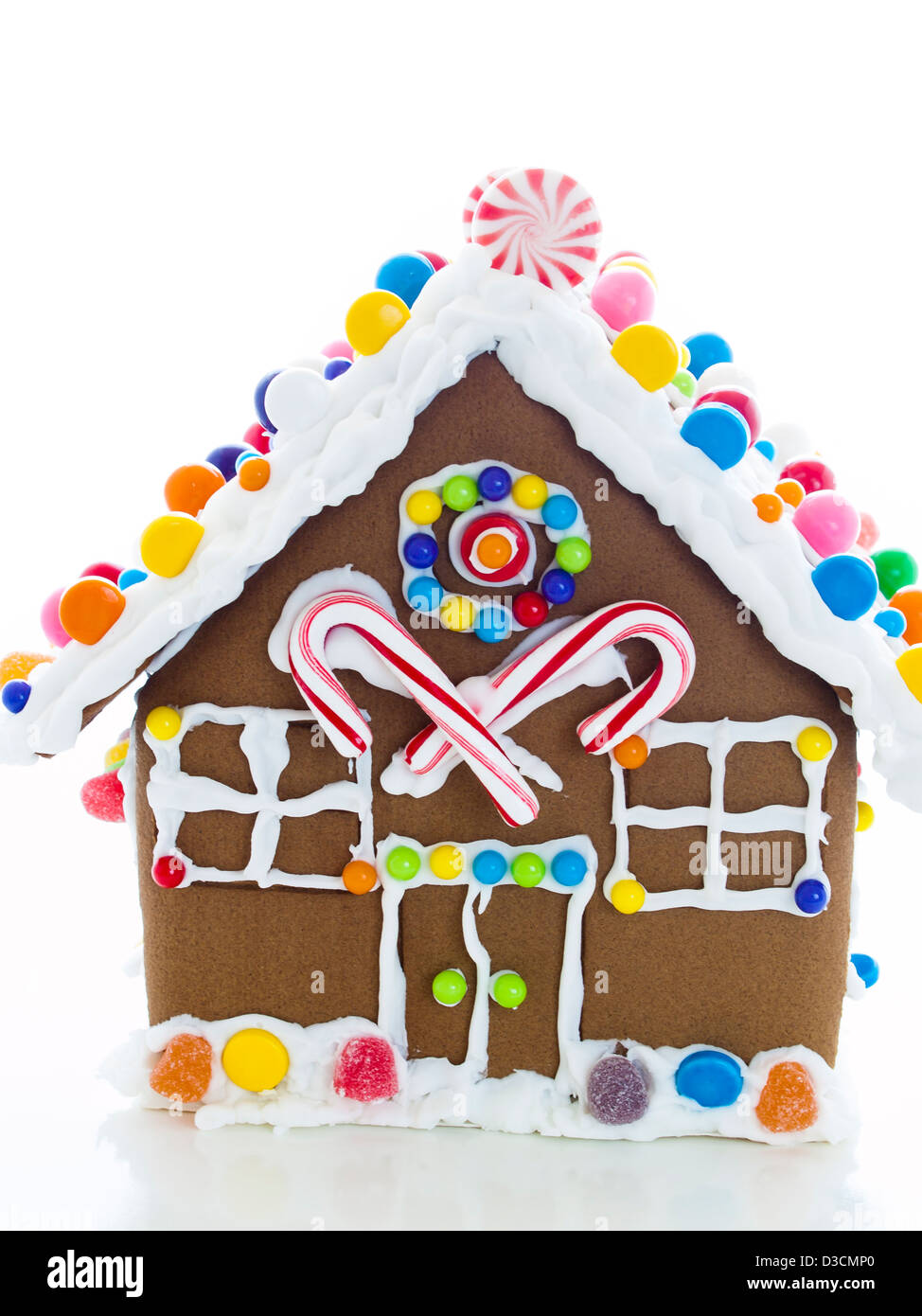 Decorated gingerbread house on white background Stock Photo - Alamy