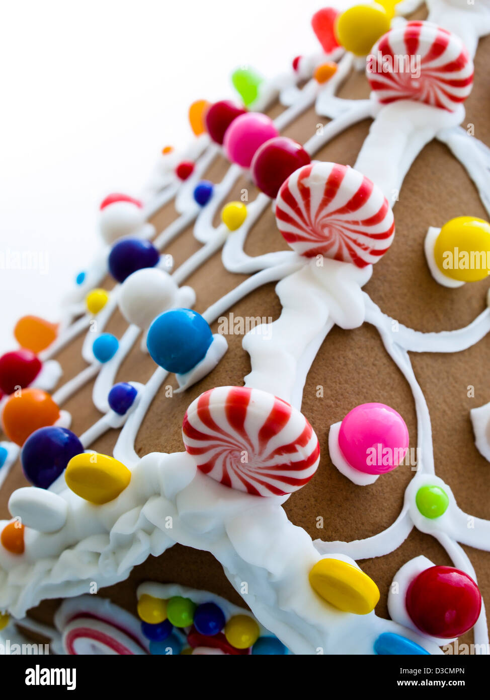 Decorated gingerbread house on white background Stock Photo - Alamy