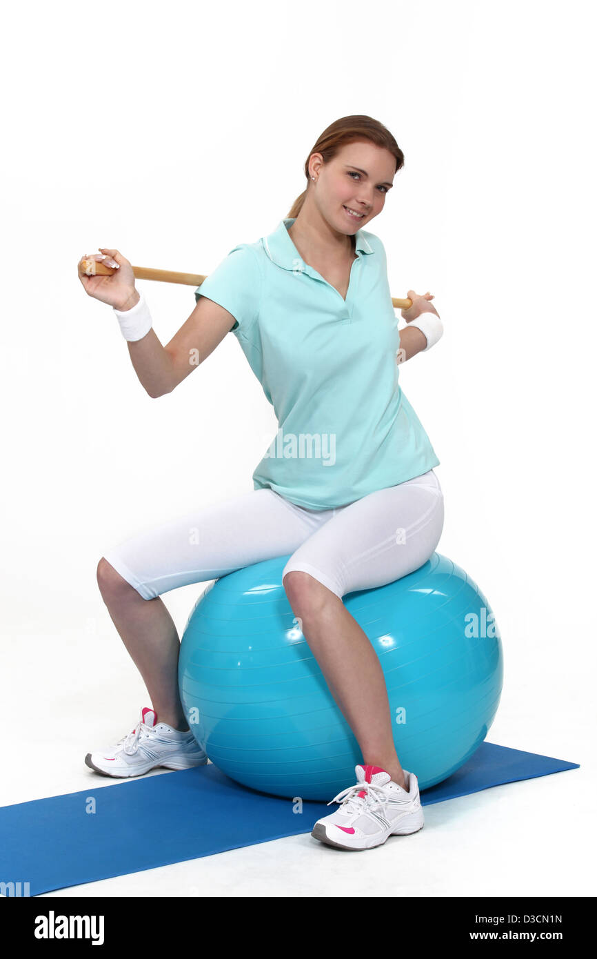 Young woman with an exercise ball Stock Photo - Alamy