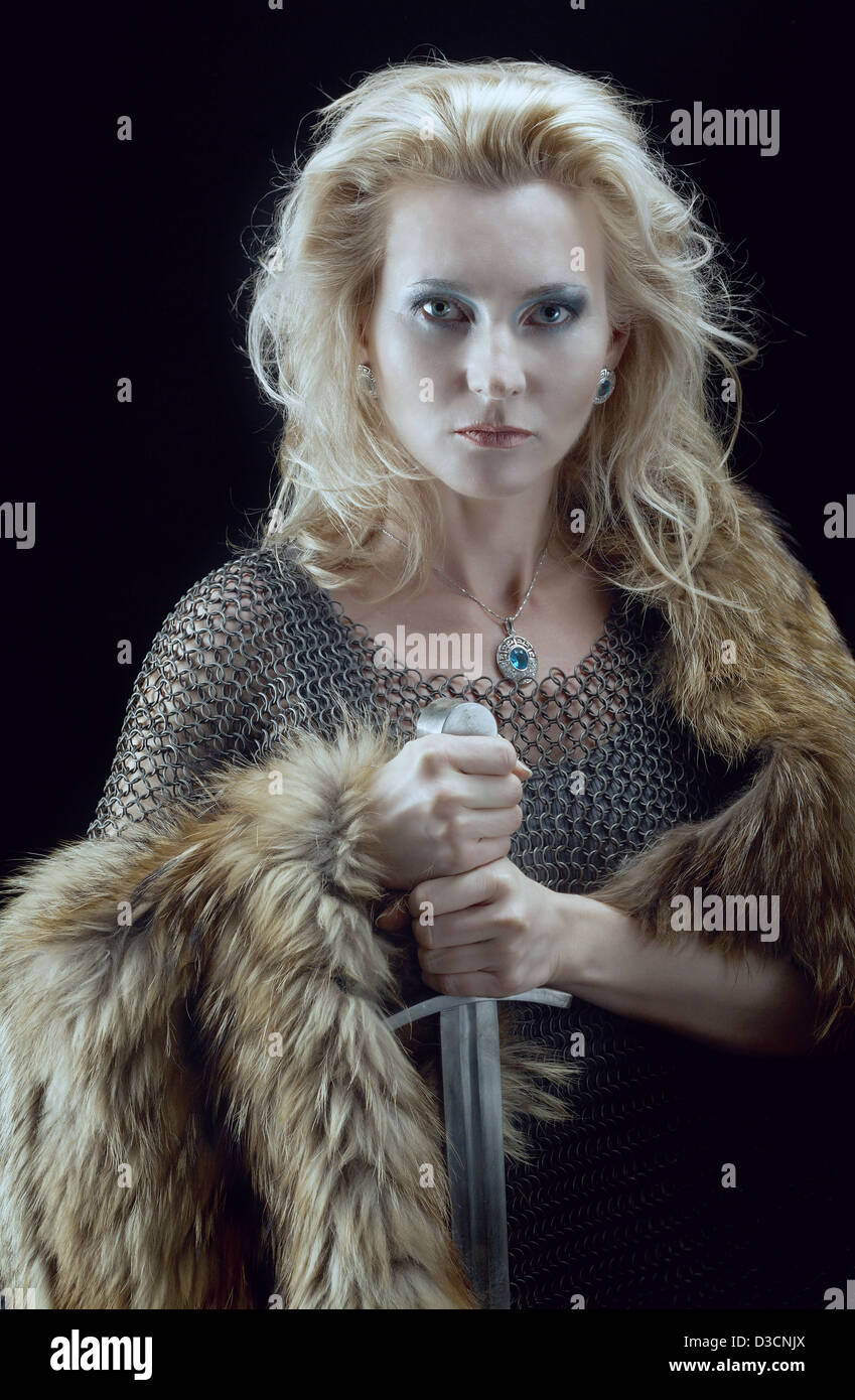 Valkyrie.Viking girl with sword Stock Photo - Alamy