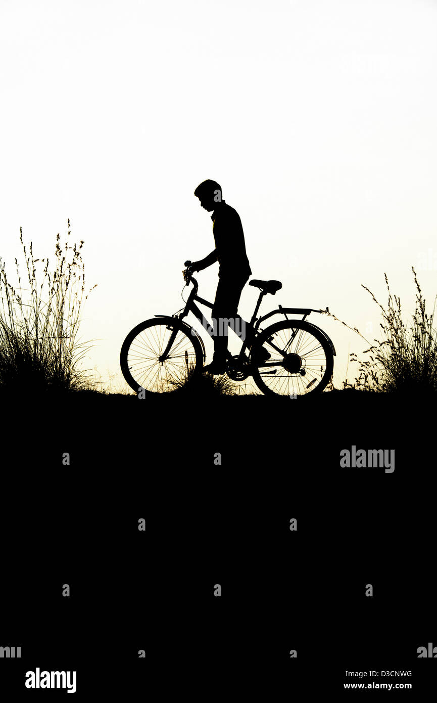 Indian boy cycling hi-res stock photography and images - Alamy