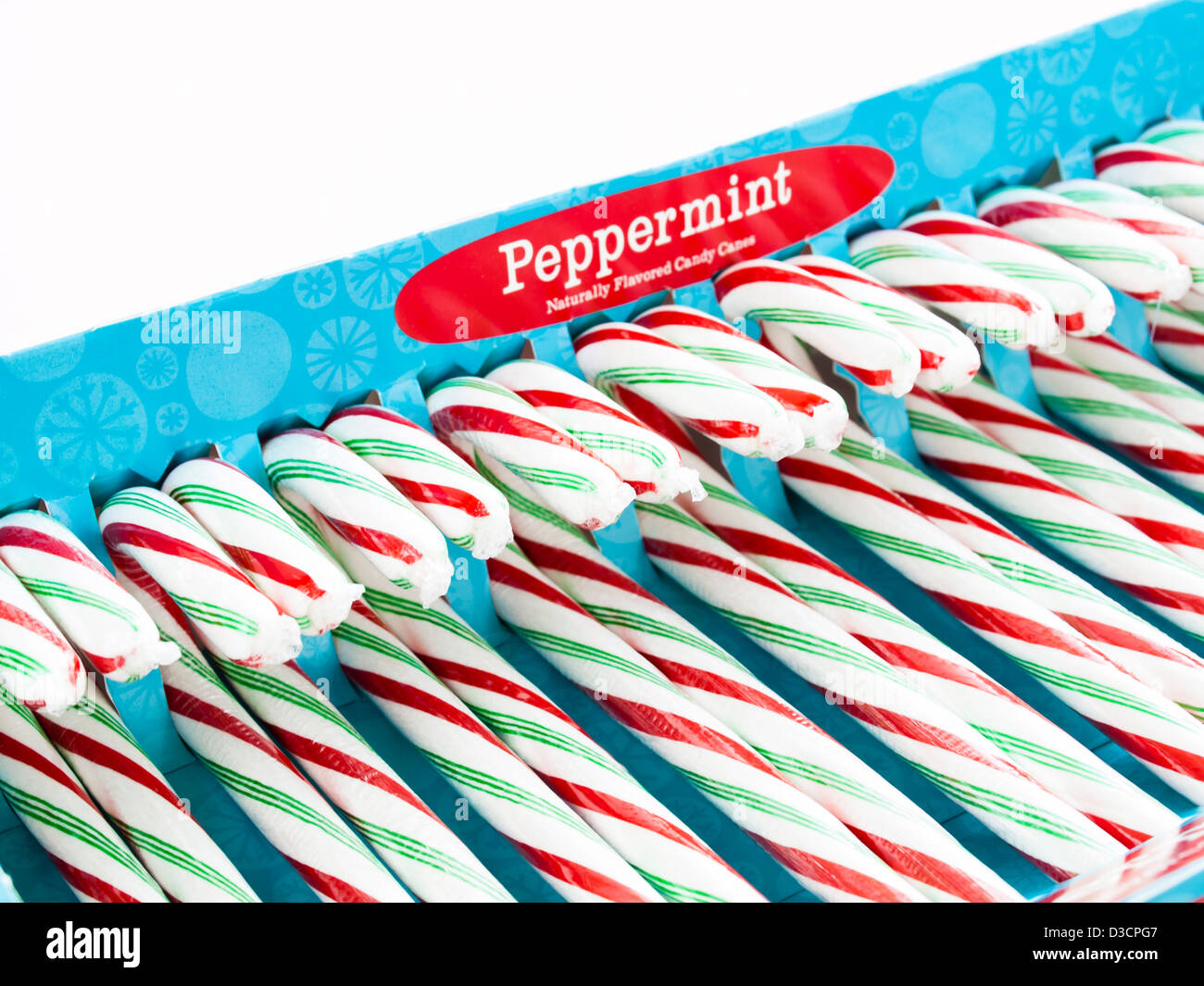 White, red and green peppermint candy canes in a box Stock Photo - Alamy