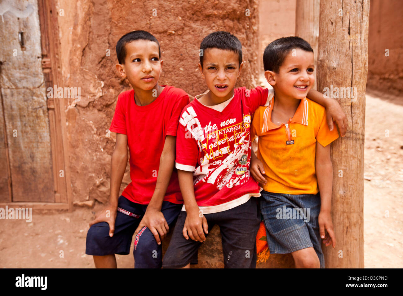 Portrait of three boys in Berber village, Marrakech, Morocco Stock ...
